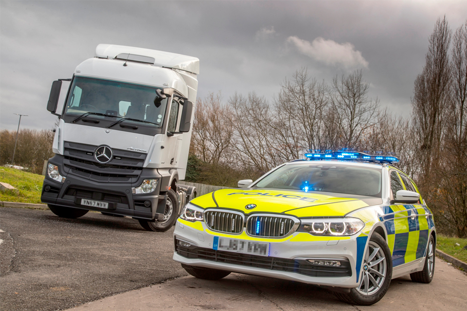 Footage shows lorry driver with a mobile phone to each ear on motorway ...