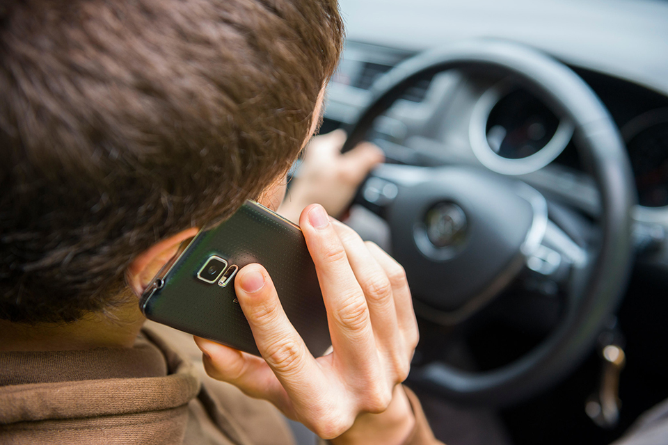 Any use of hand-held mobile phone while driving to become illegal - GOV.UK
